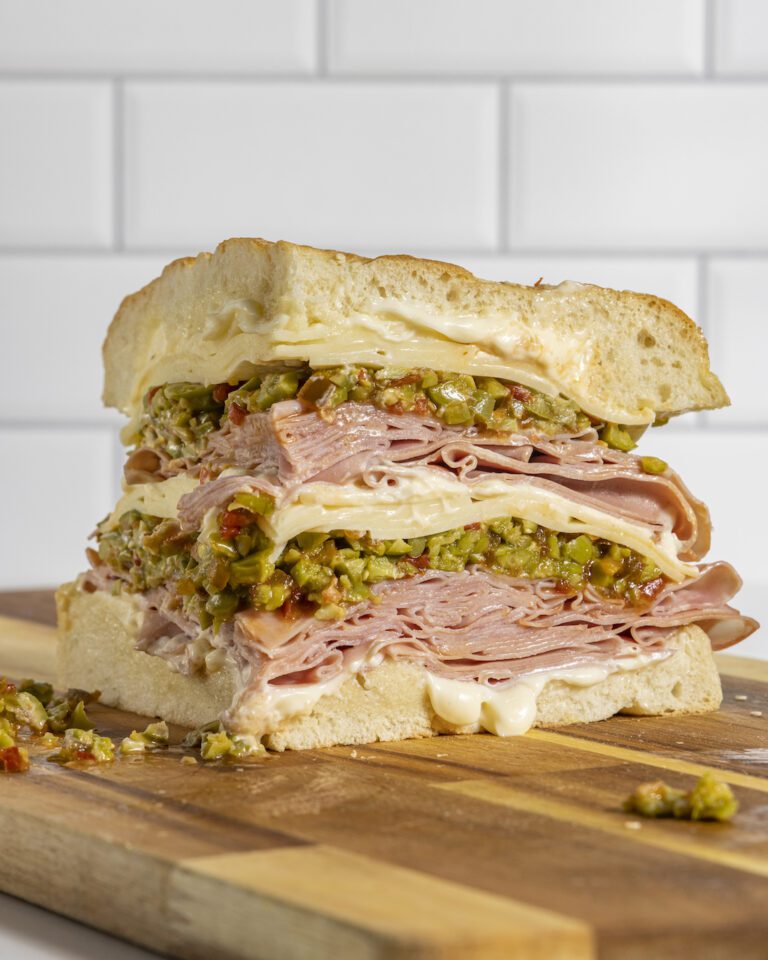 The Story Behind the Muffuletta Sandwich- The Local Palate